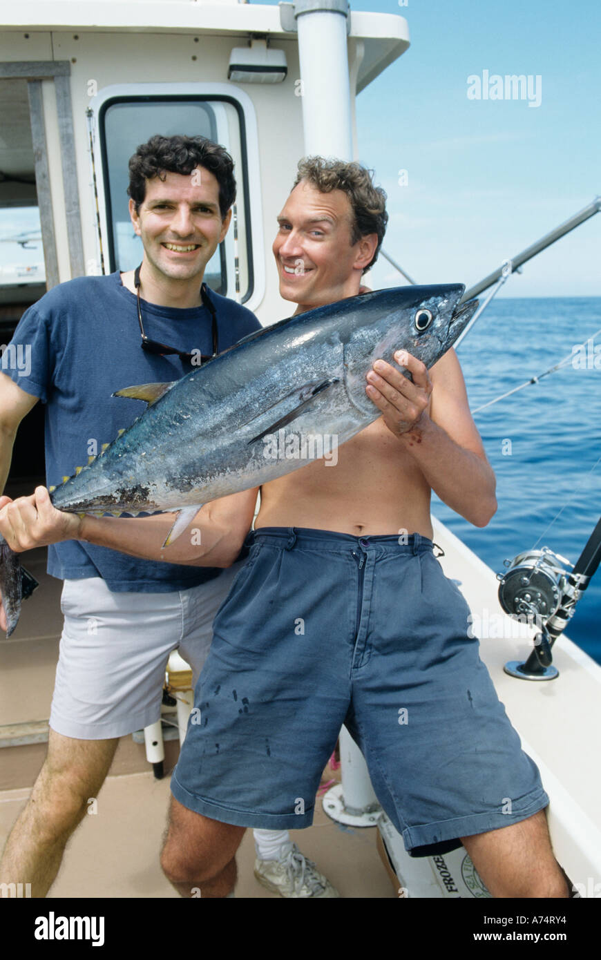 Fishermen showing off the catch hi-res stock photography and images - Alamy