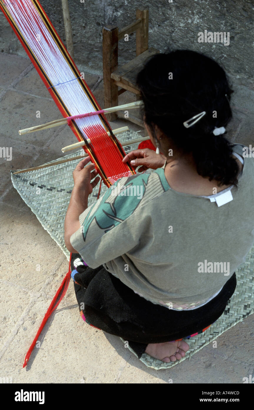 Mexico, Oaxaca. Mayan woman weaving on a backstrap loom Stock Photo - Alamy