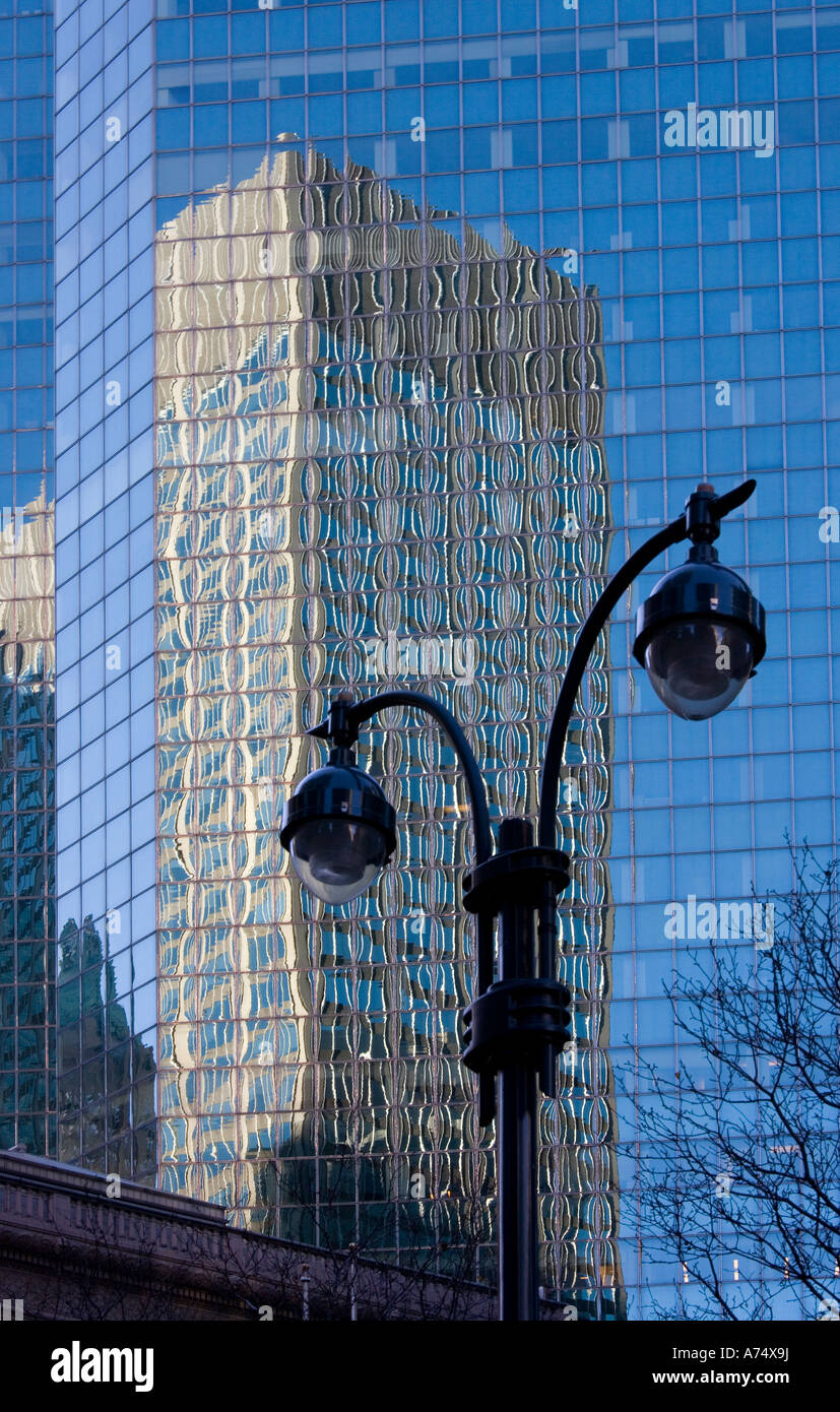 warped reflection of manhattan in glass windows Stock Photo - Alamy