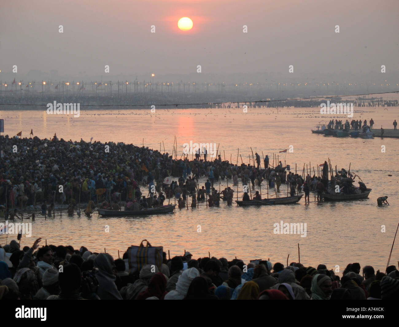 People bathing near the sangum on an auspicious bathing day Kumbh Mela ...