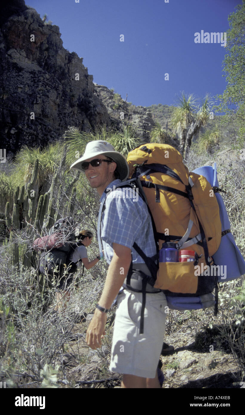 NA, Mexico, Baja Mexico. NOLS student Greg Connor backpacking in the ...