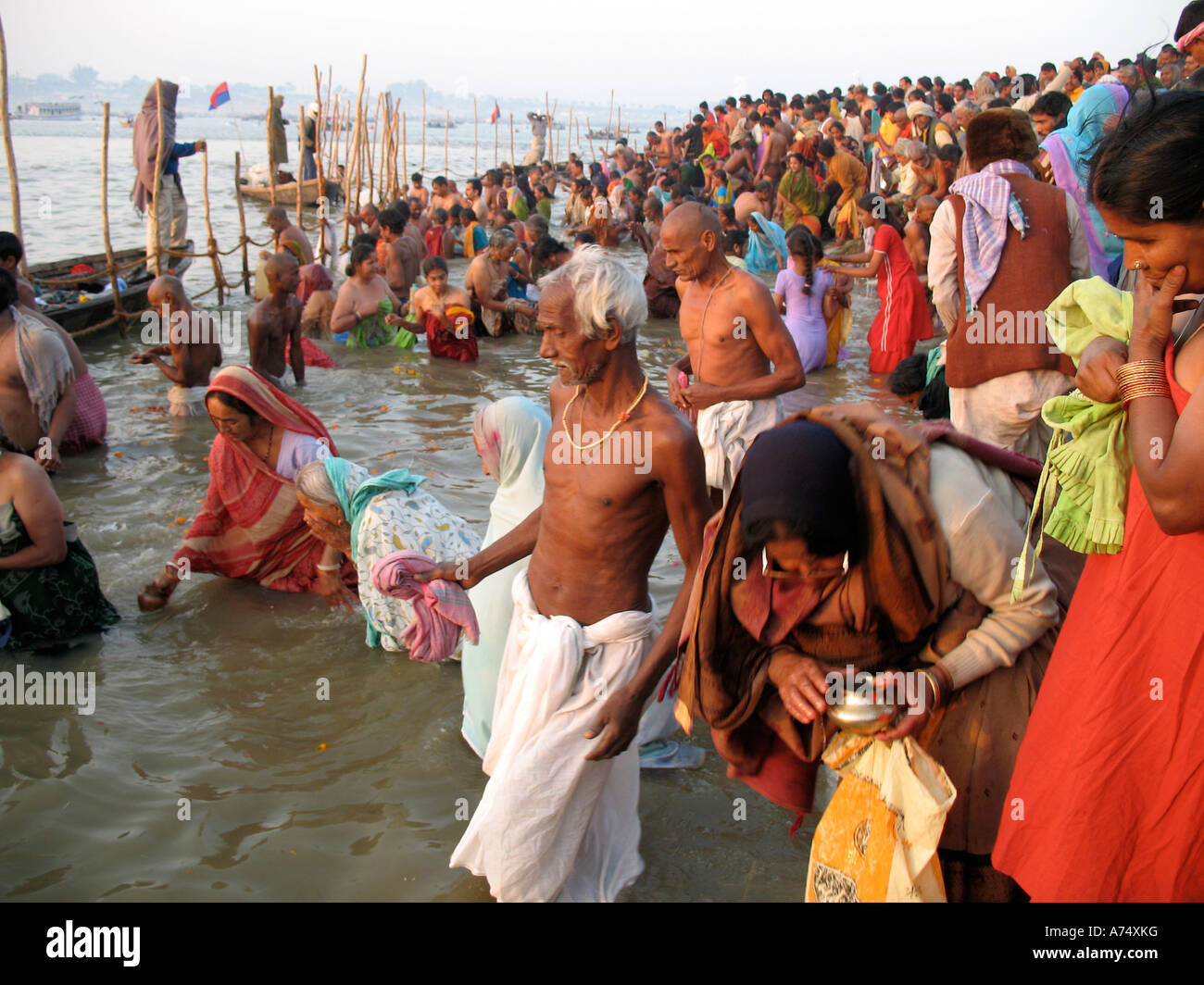 People bathing near the sangum on an auspicious bathing day at the ...