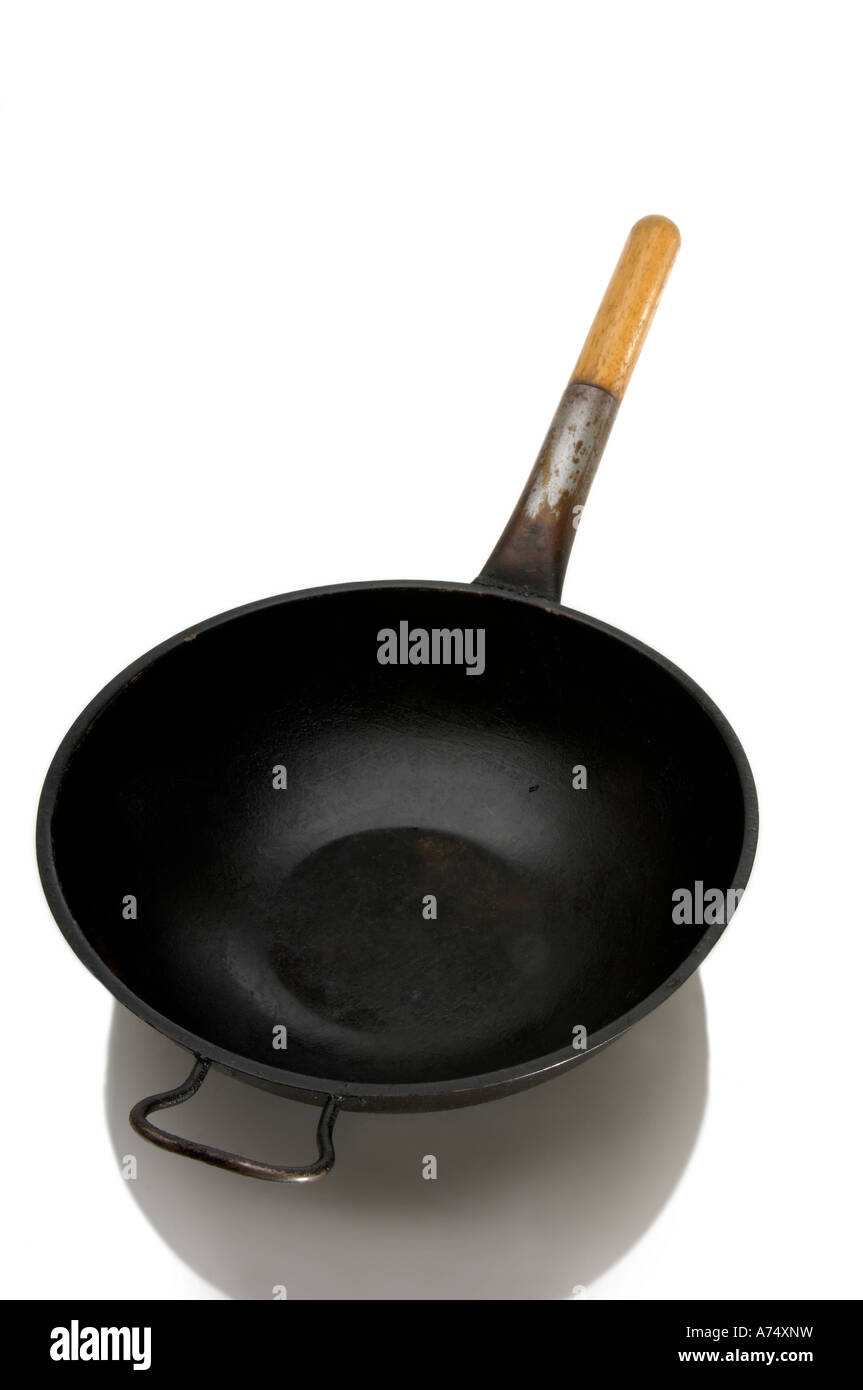 Black wok on white background Stock Photo - Alamy