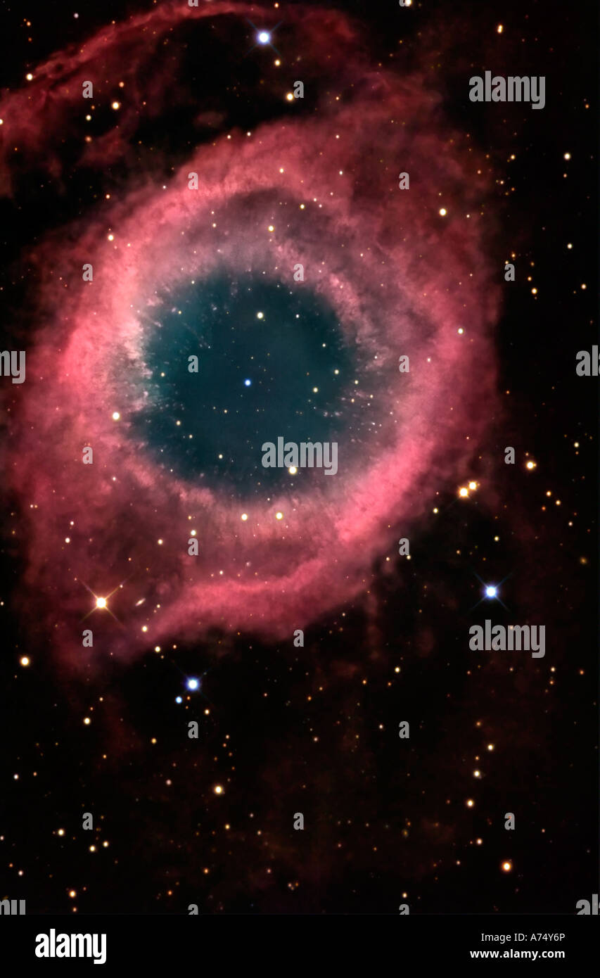 The Helix Nebula, also known as NGC 7293, is a planetary nebula in the ...
