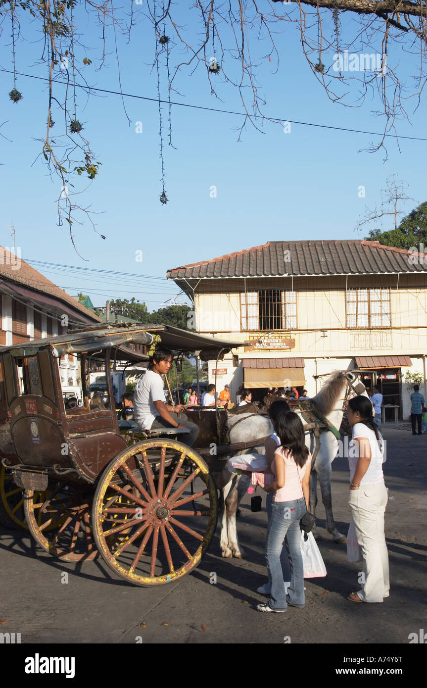 People Getting On Horse Drawn Carriage, Vigan Stock Photo - Alamy