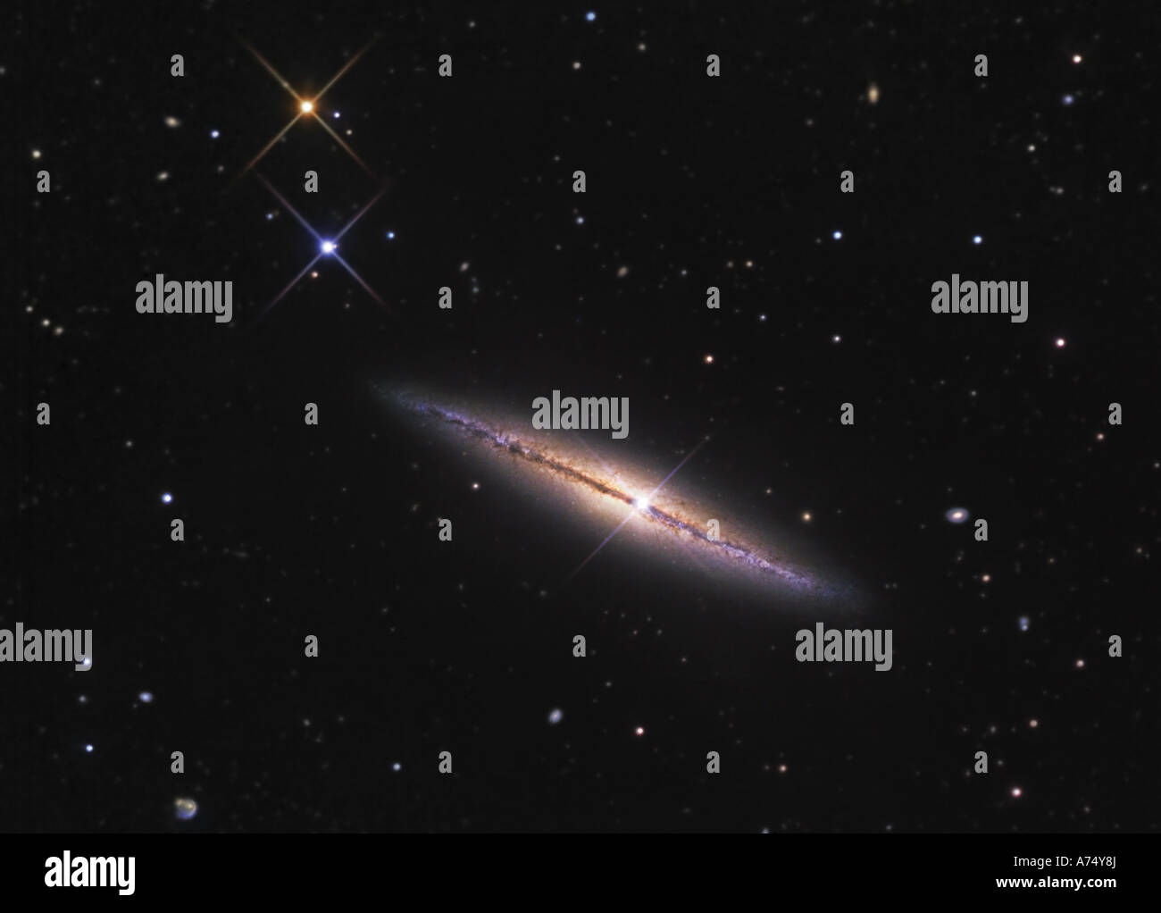 NGC 4013 is an edge-on unbarred spiral galaxy in the constellation Ursa ...