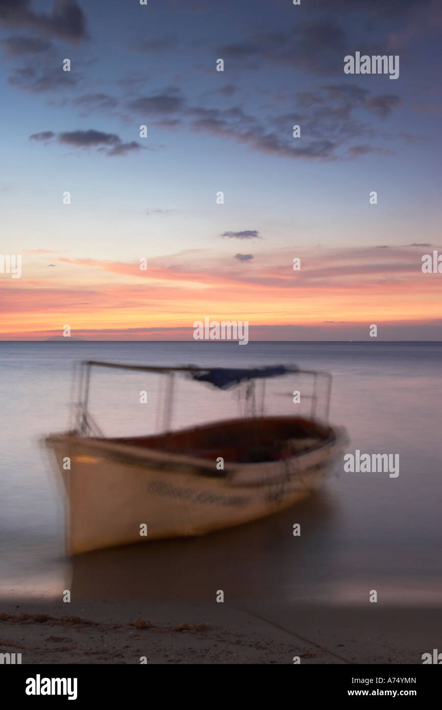 Philippines, Rowing Boat At Sunset Stock Photo - Alamy
