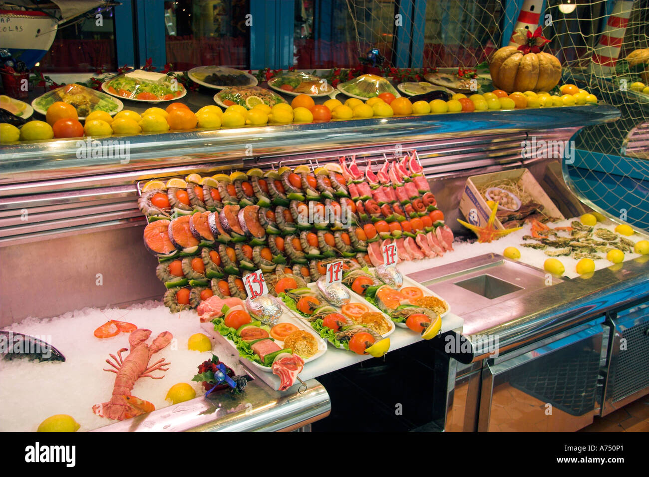 Seafood brochettes on display outside a small café on Rue de la ...