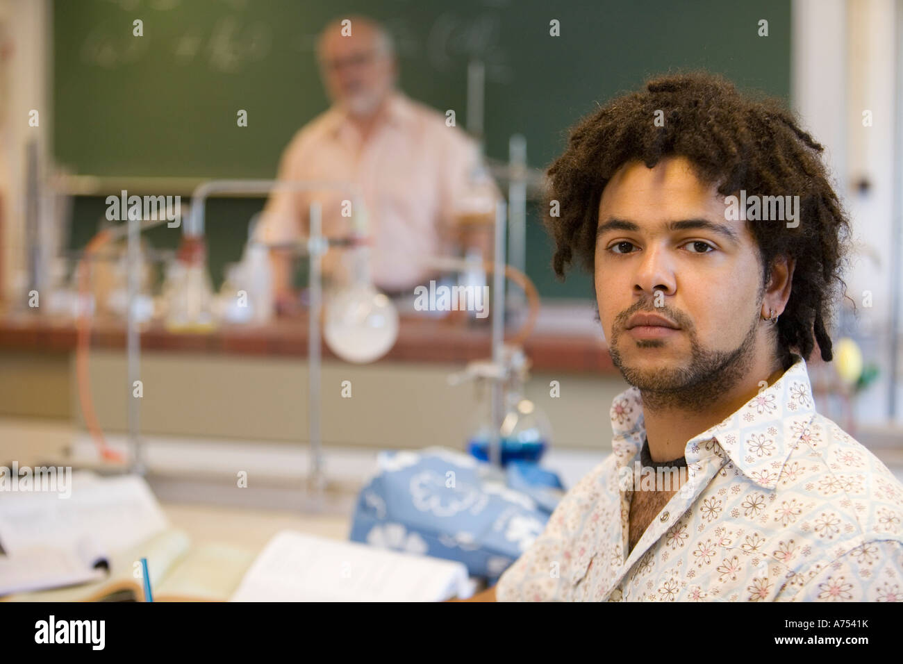 Male student in science class Stock Photo - Alamy