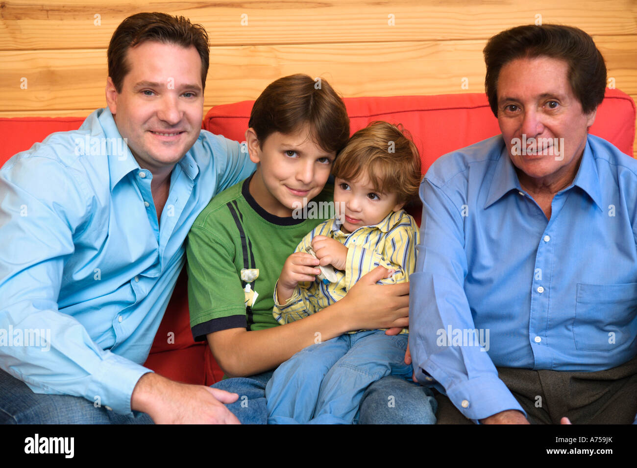Three generations of men sitting together Stock Photo - Alamy