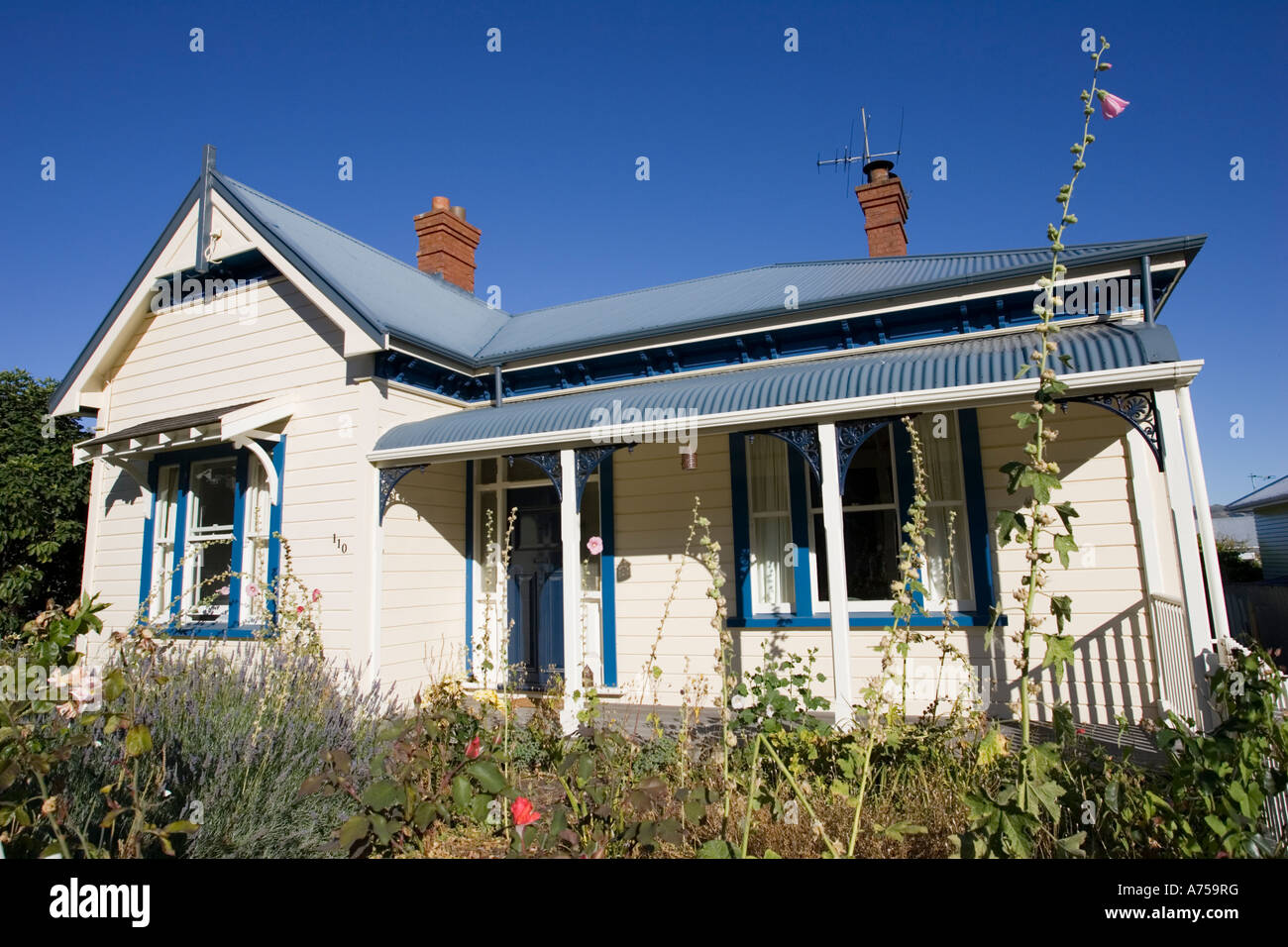 Old white timber cottage Akaroa Banks Peninsula New Zealand Stock Photo ...