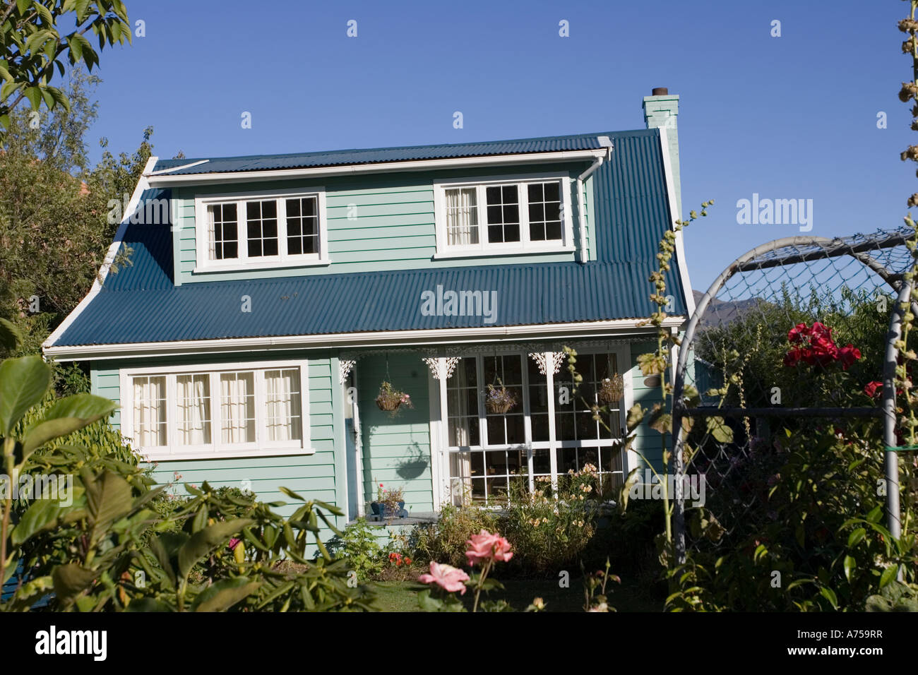 Attractive old timber house with flower garden Akaroa Banks Peninsula ...