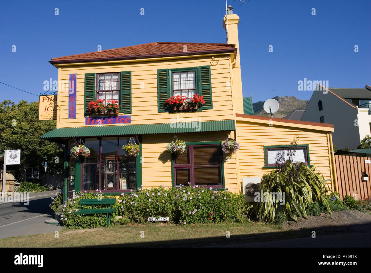 Attractive cafe with hanging baskets Akaroa harbour Banks Peninsula New ...