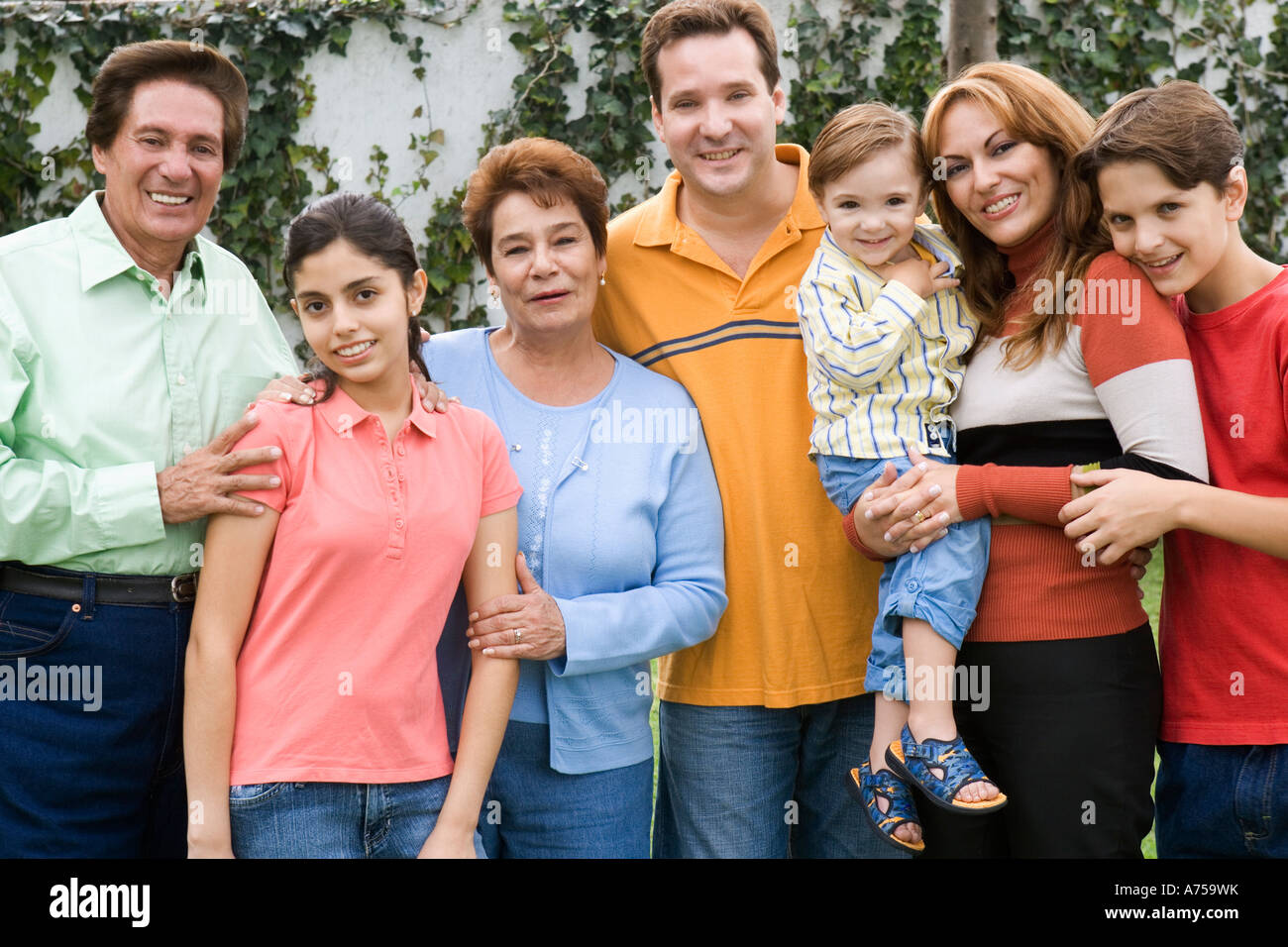 Family smiling together Stock Photo - Alamy