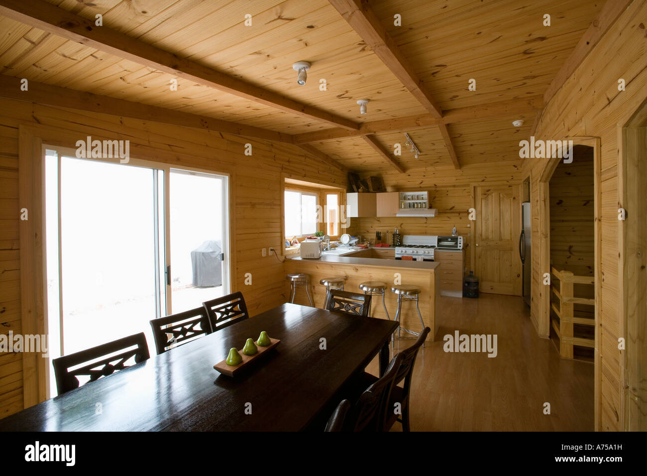 Empty dining room and kitchen Stock Photo - Alamy