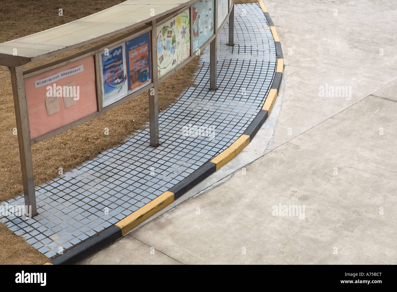 High-angle view of curved urban bus stop Stock Photo - Alamy