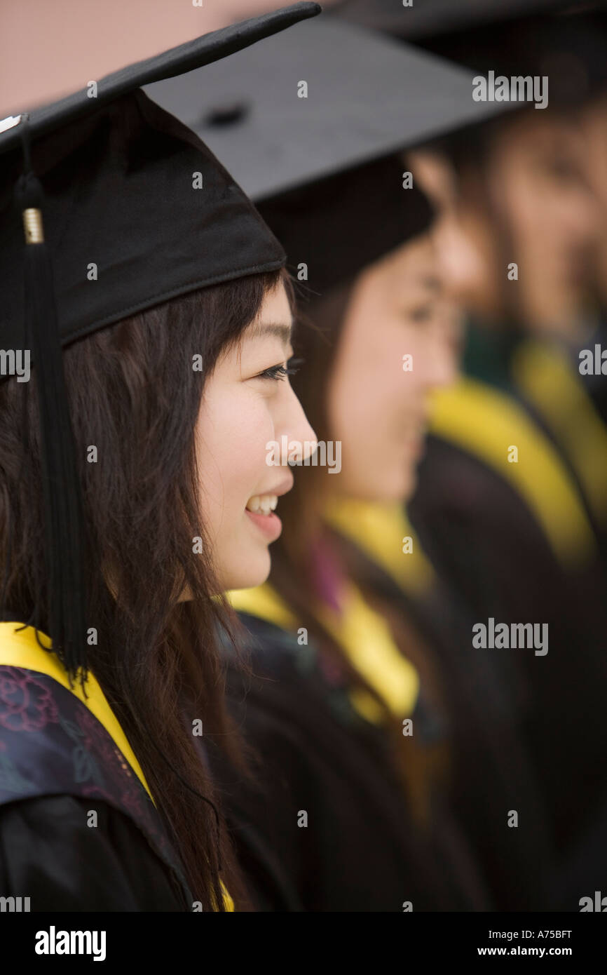 Row of students in graduation robes Stock Photo - Alamy