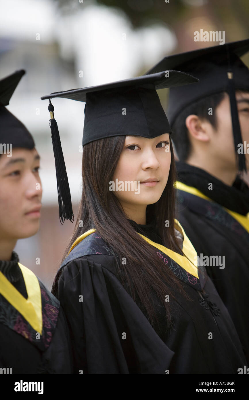 Row of students in graduation robes Stock Photo - Alamy