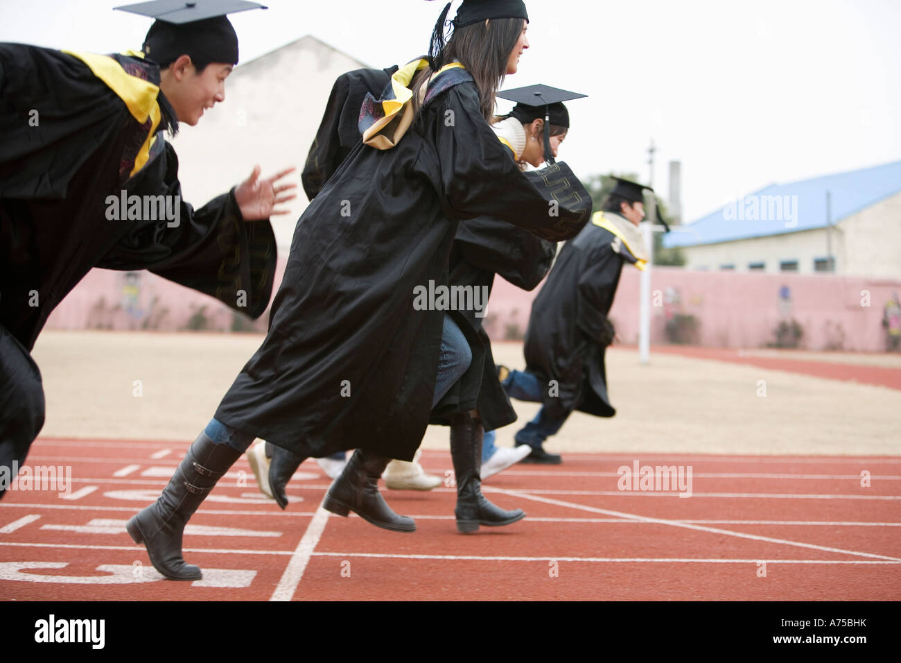 Student running graduation cap hi-res stock photography and images - Alamy