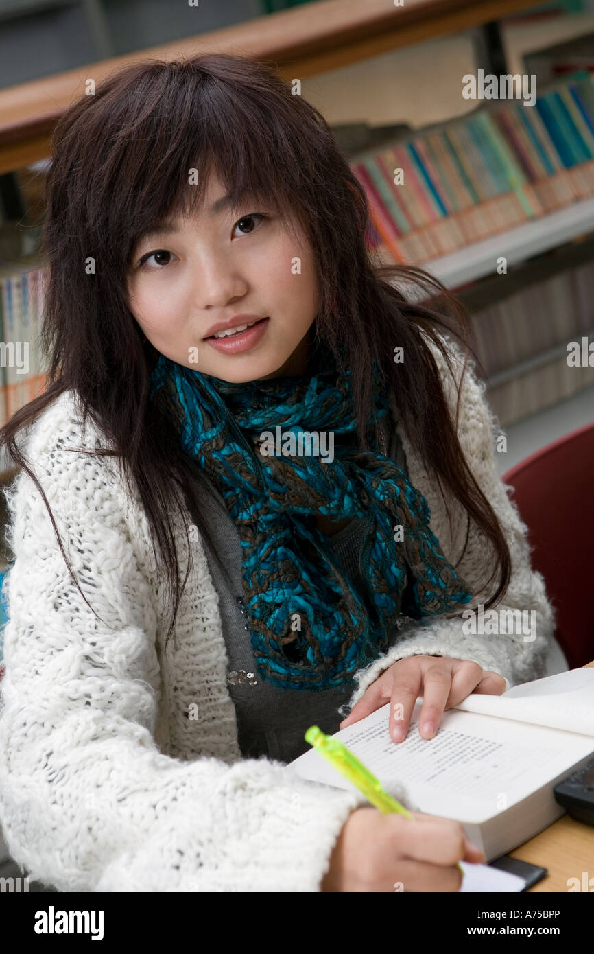 Female student studying Stock Photo - Alamy