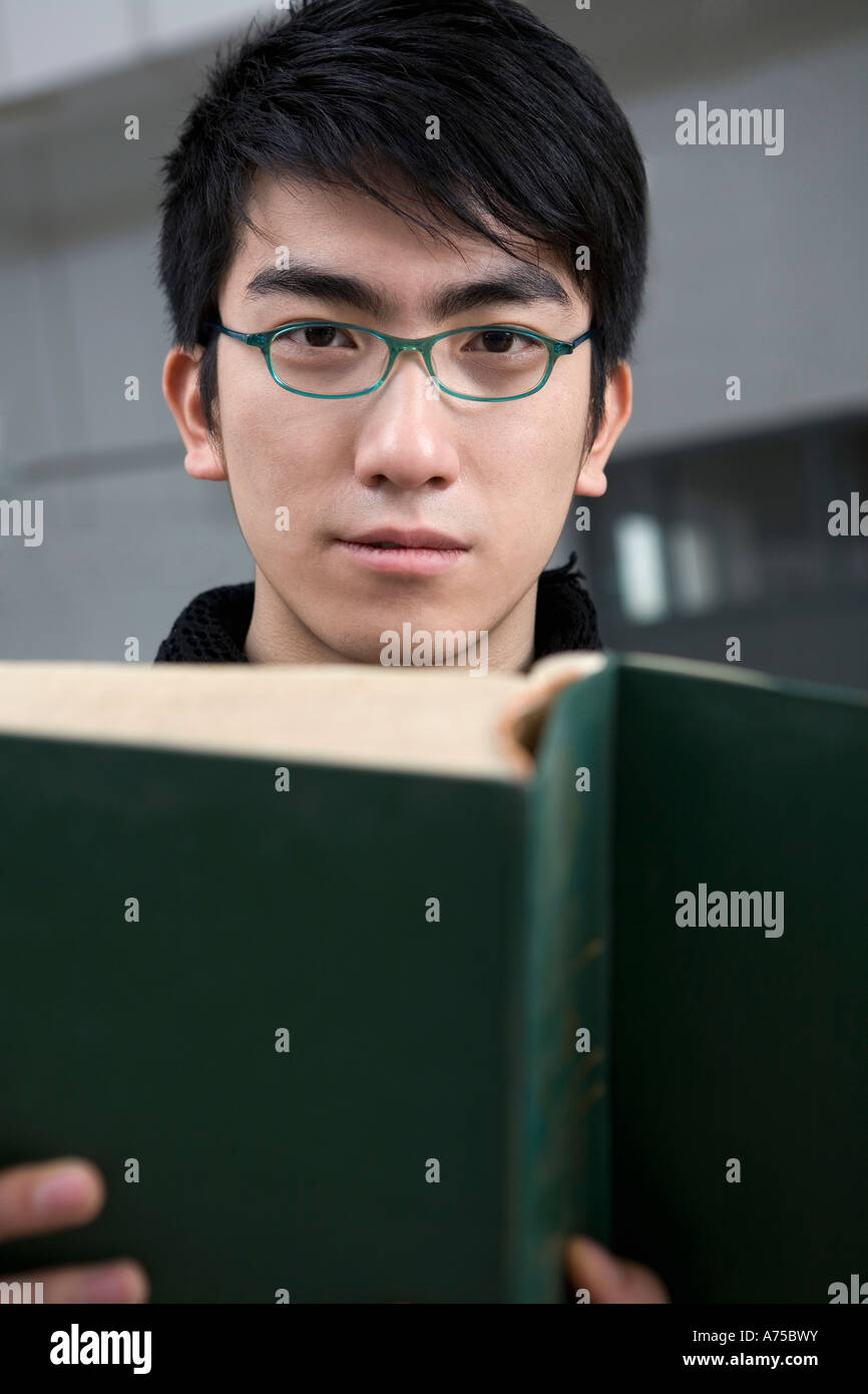 Male student studying Stock Photo - Alamy