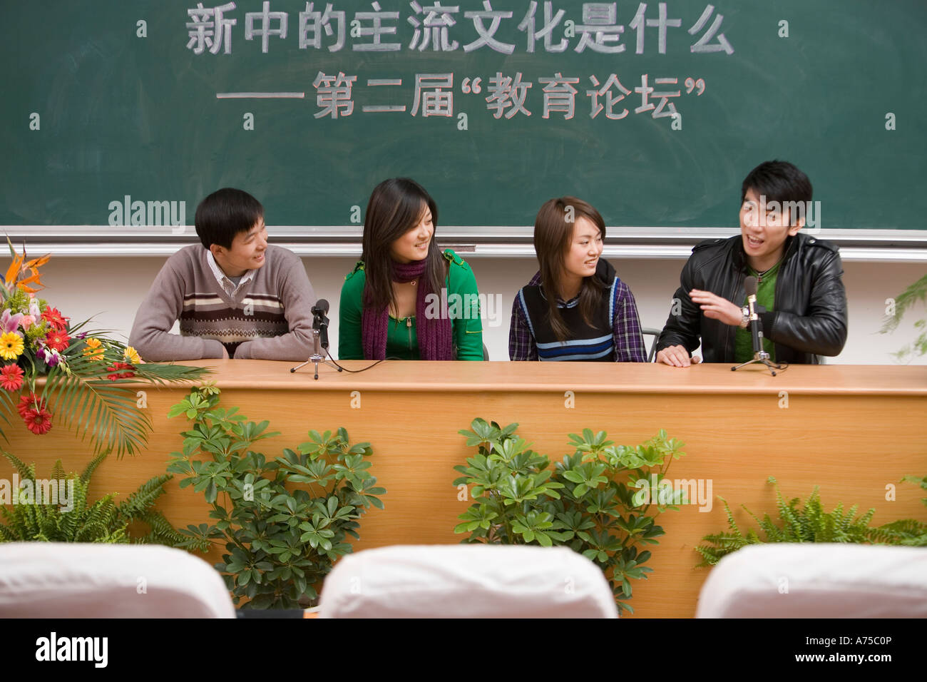 Student speaking in front of a class hi-res stock photography and ...