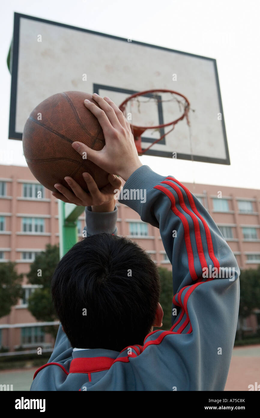 Chinese boys playing basketball hi-res stock photography and images - Alamy