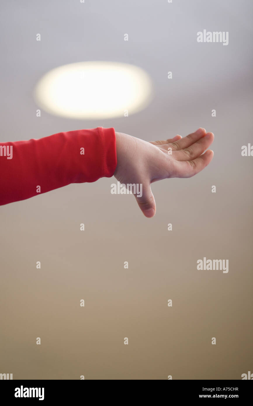 Young girl's curved hand Stock Photo - Alamy
