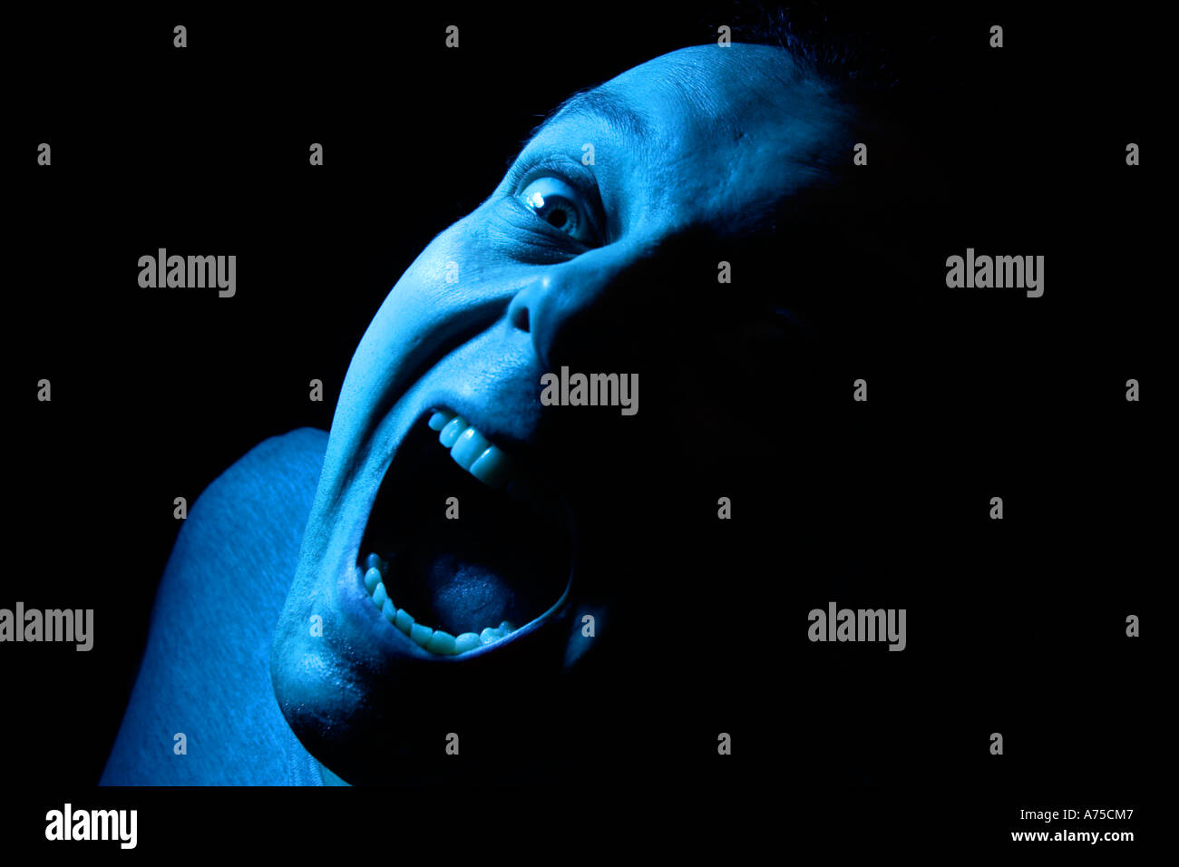 Screaming face Stock Photo - Alamy