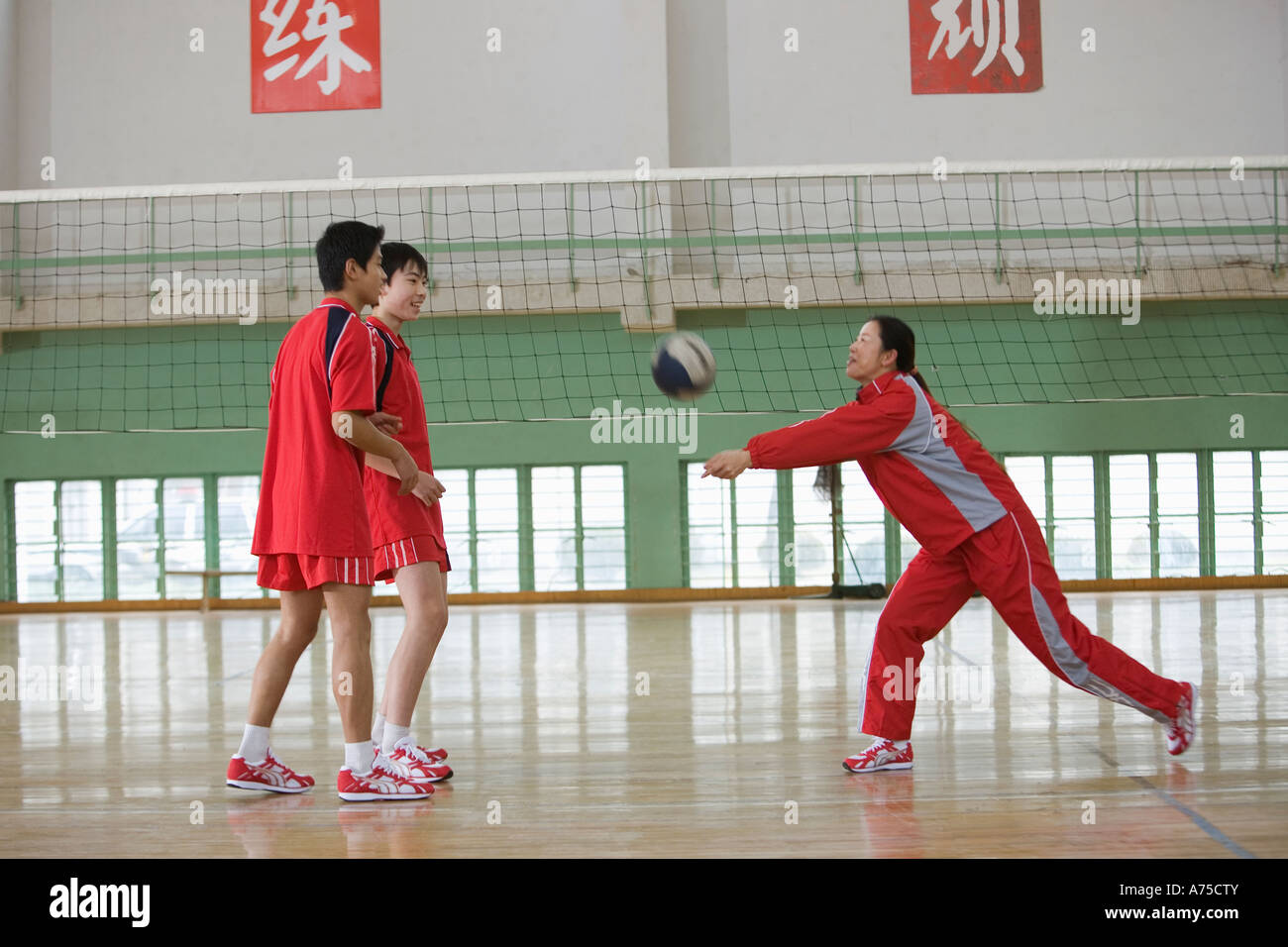 Gym coach volleyball hi-res stock photography and images - Alamy