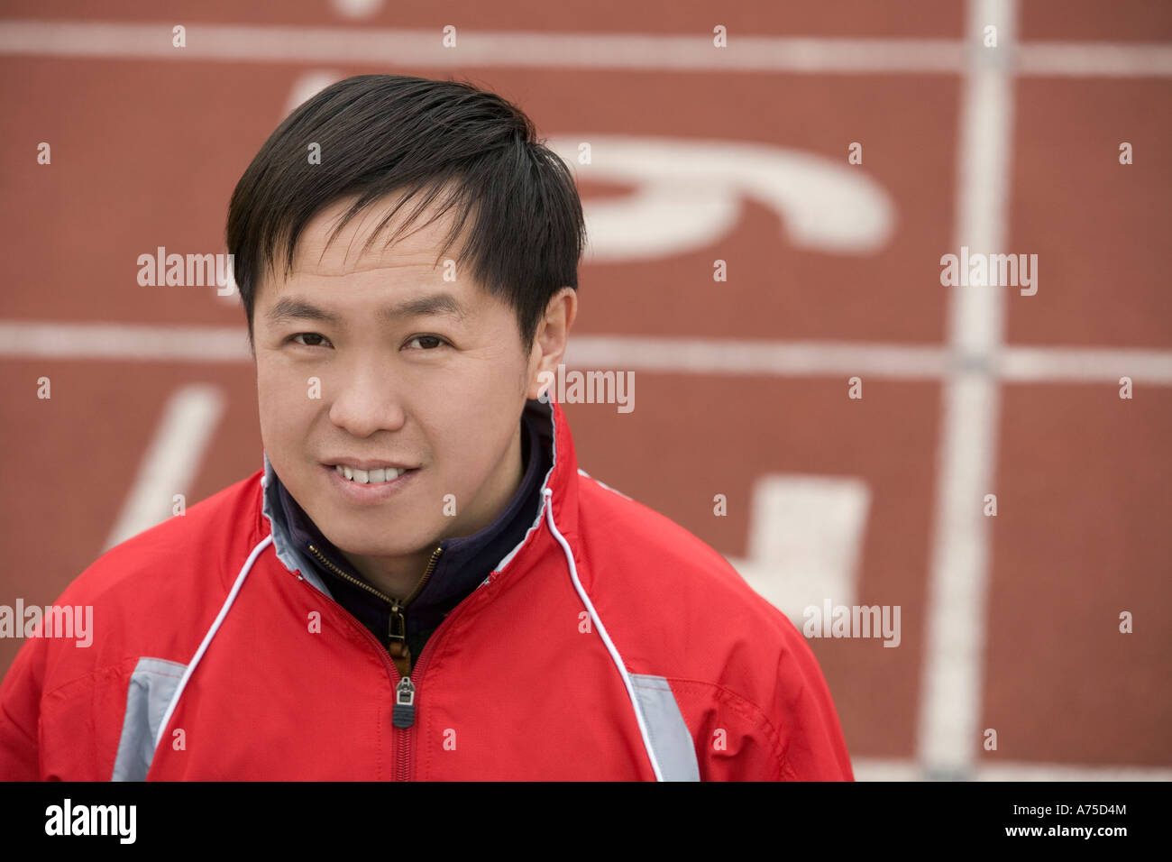 Man standing on track Stock Photo - Alamy