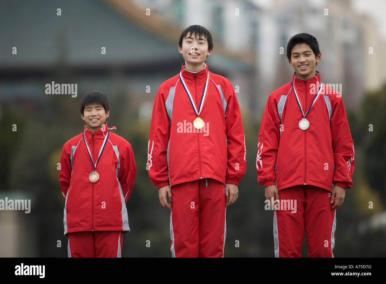 Athletes standing on podiums Stock Photo - Alamy