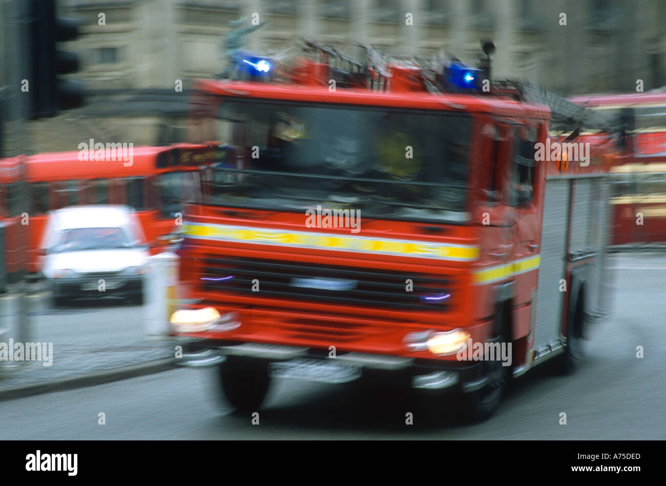 Fire engine speeding to fire England UK Stock Photo - Alamy