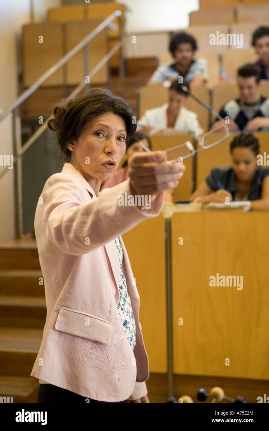 Science teacher lecturing to class Stock Photo - Alamy
