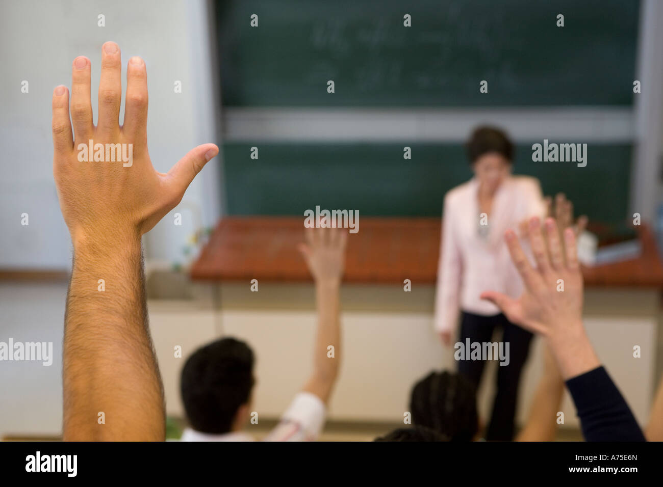 Students raising their hands in class Stock Photo - Alamy Students raising their hands in class Stock Photo - Alamy