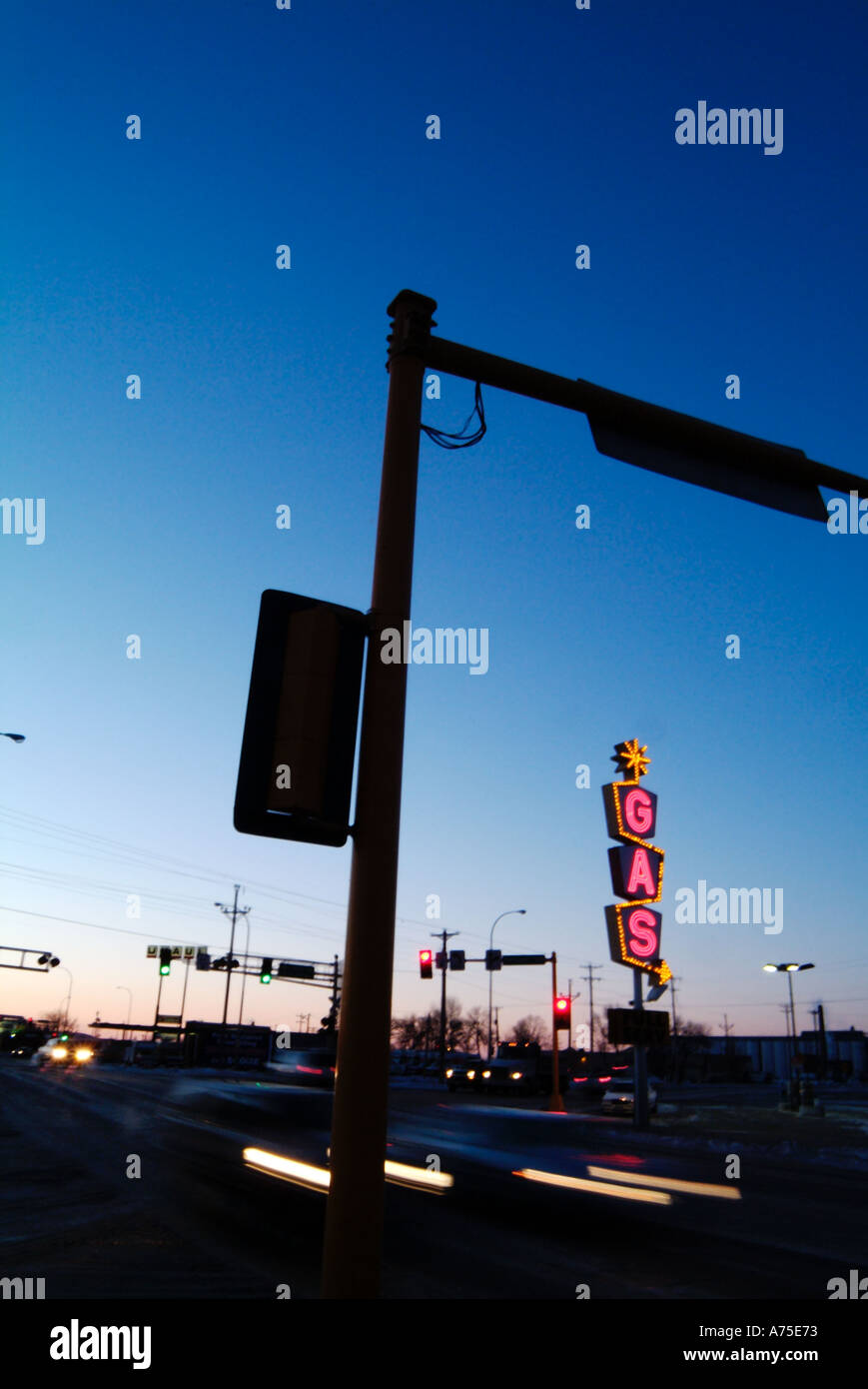 Traffic intersection and gas station sign Stock Photo - Alamy