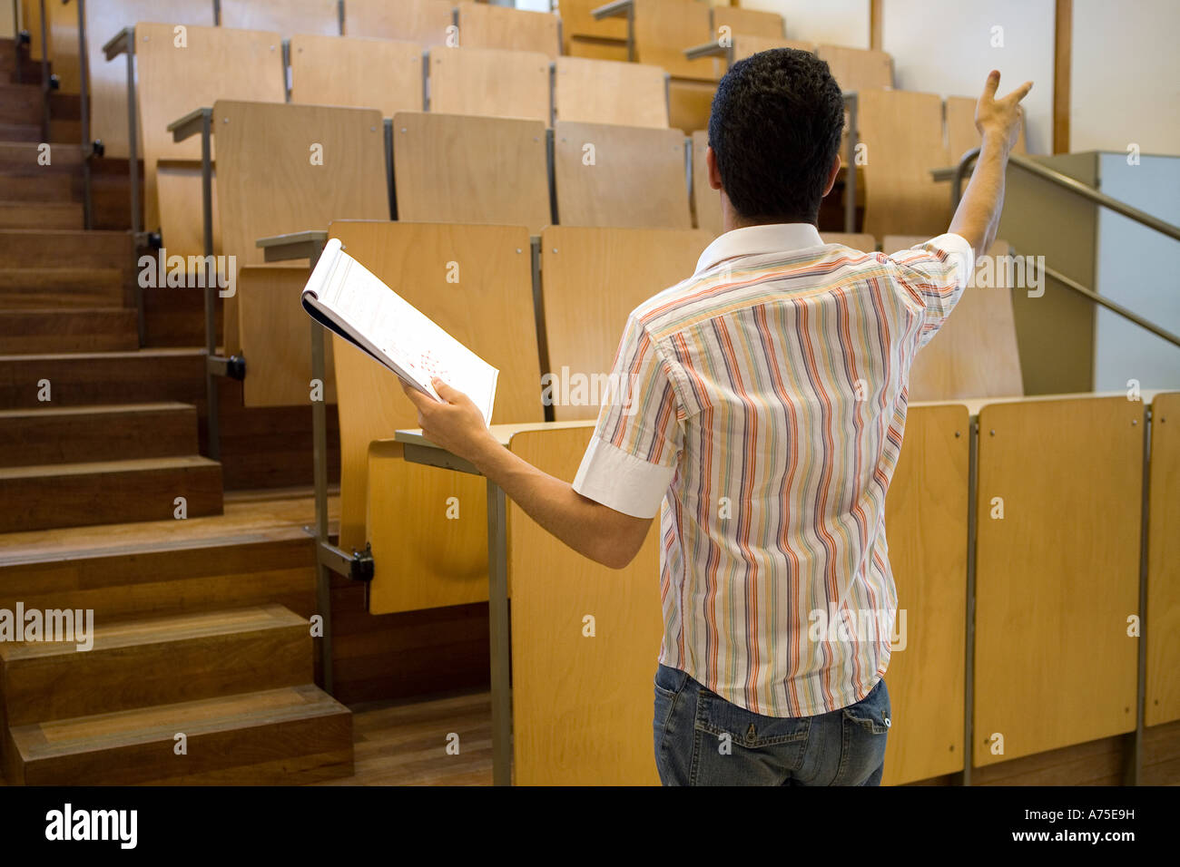 Student talking empty classroom hi-res stock photography and images - Alamy