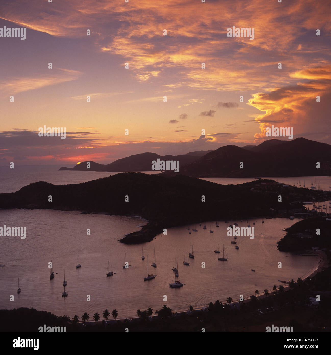 Sunset over the south coast English Harbour and Nelsons Dockyard from ...