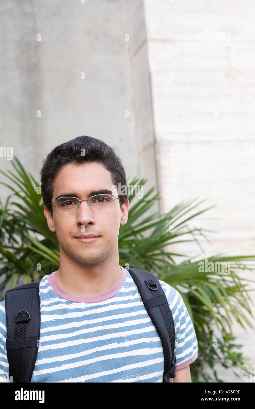 Man wearing a backpack Stock Photo - Alamy