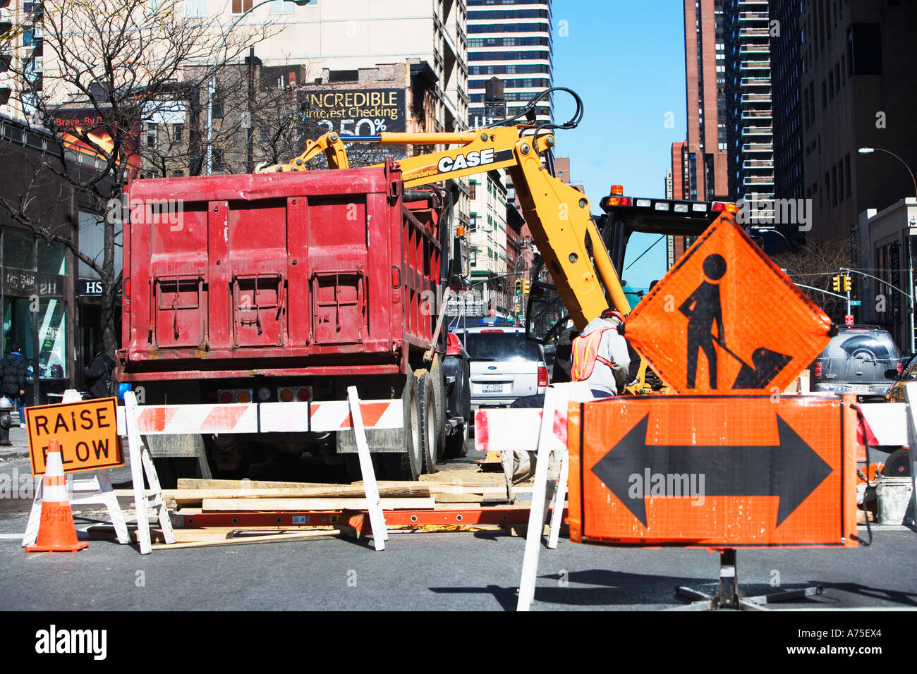 MEN WORKING SIGN Stock Photo - Alamy