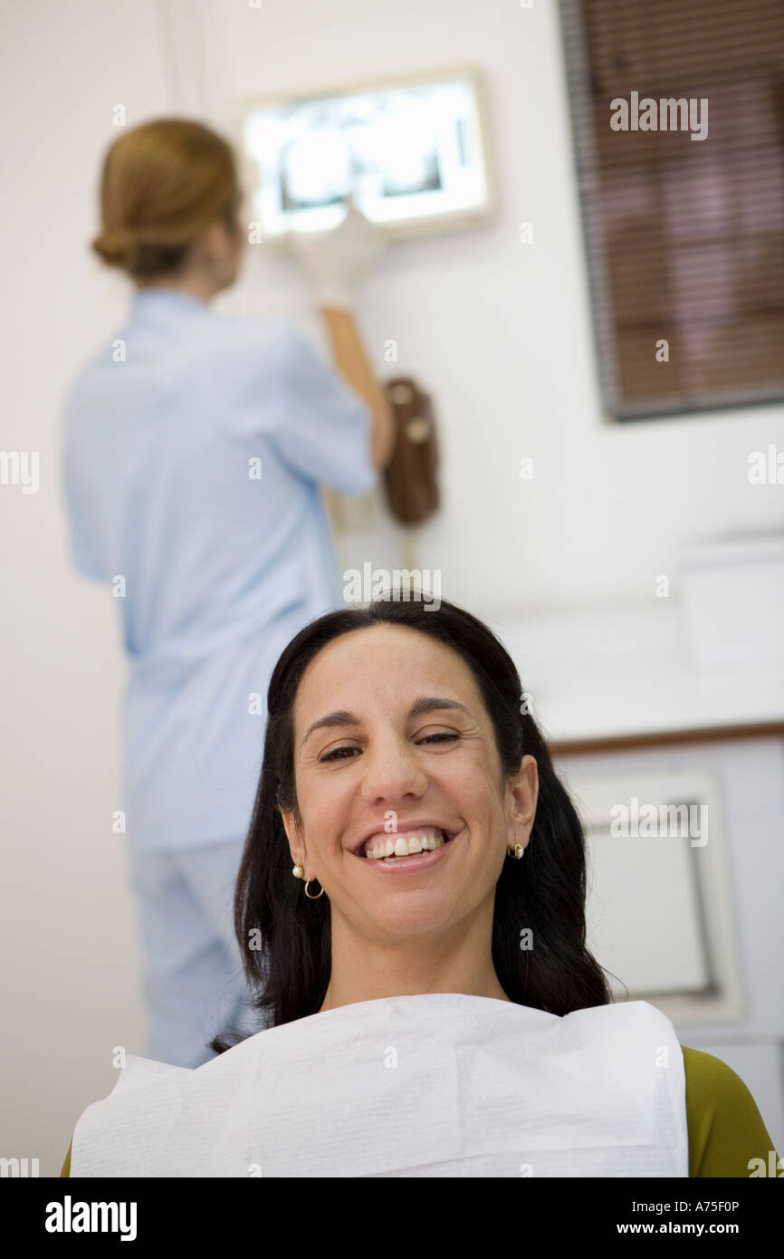 Dental patient smiling Stock Photo - Alamy