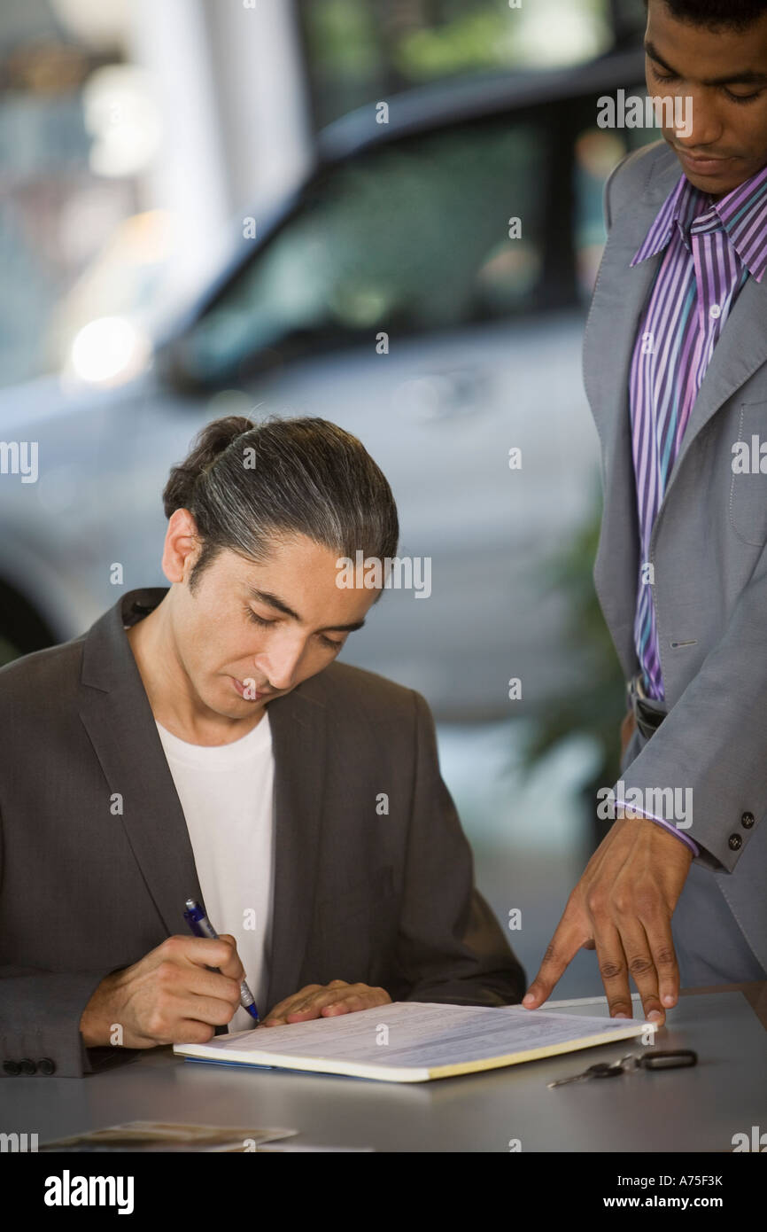 Car salesman sitting desk in hi-res stock photography and images - Alamy