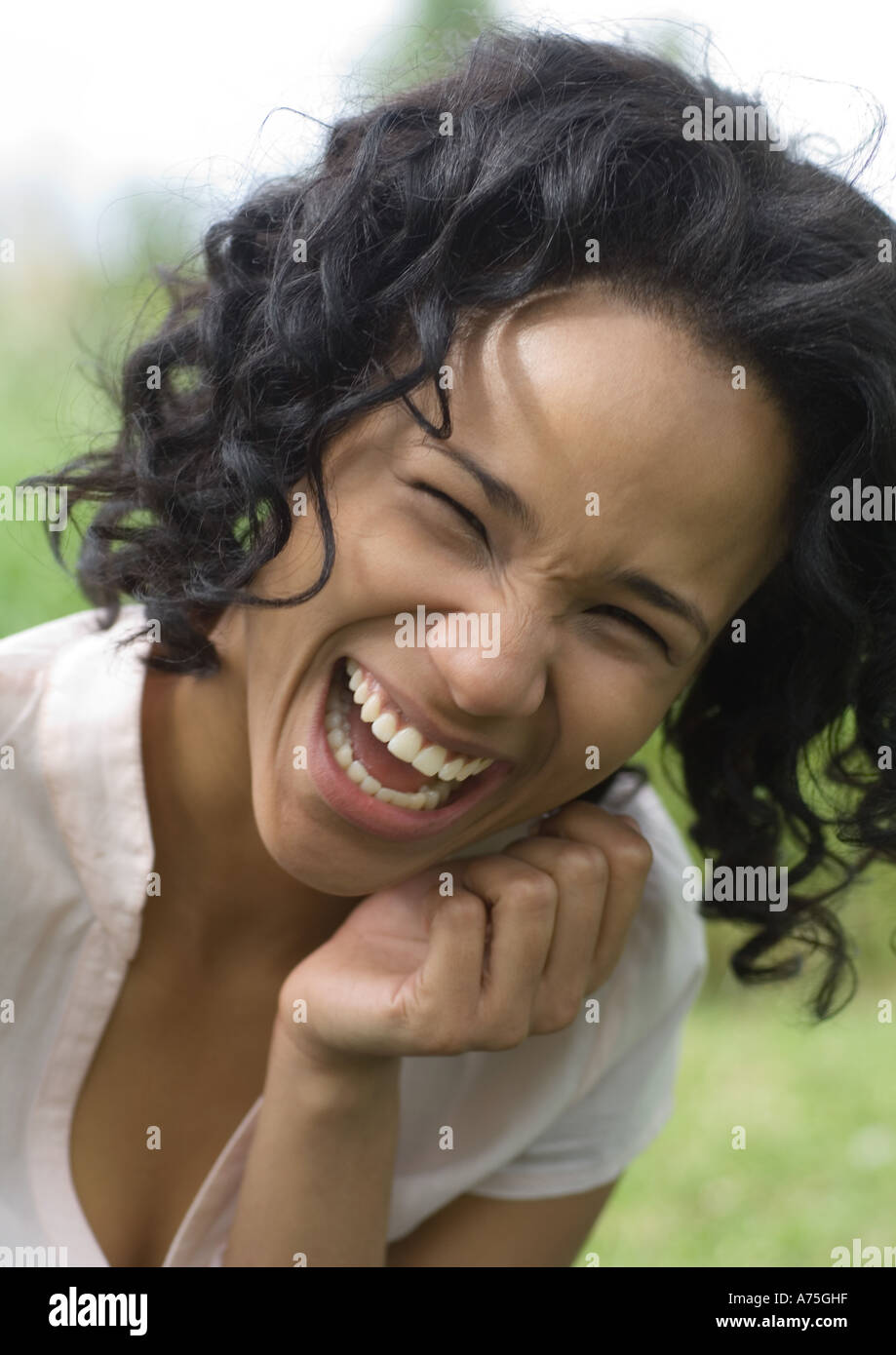 Young woman laughing, portrait Stock Photo - Alamy