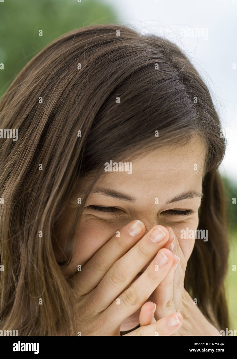 Young woman laughing embarrassment hi-res stock photography and images ...