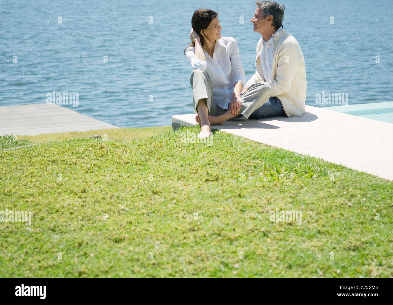 Couple Couples Distance Grass High Resolution Stock Photography and ...