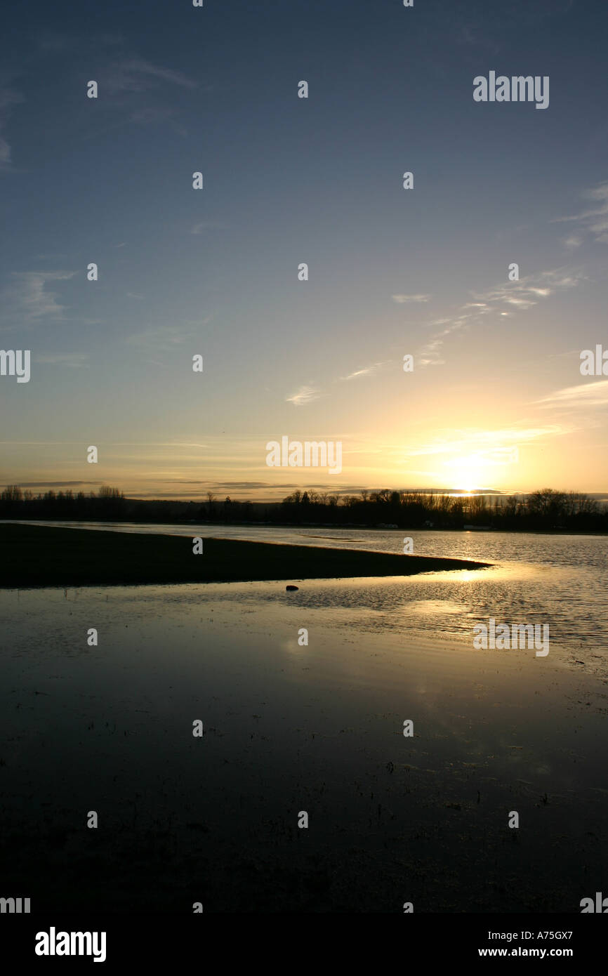 Sunset over wetlands Stock Photo - Alamy