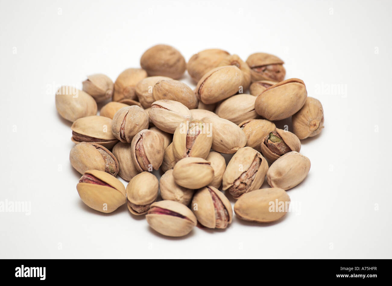 Close up of a pile of pistachio nuts Stock Photo - Alamy