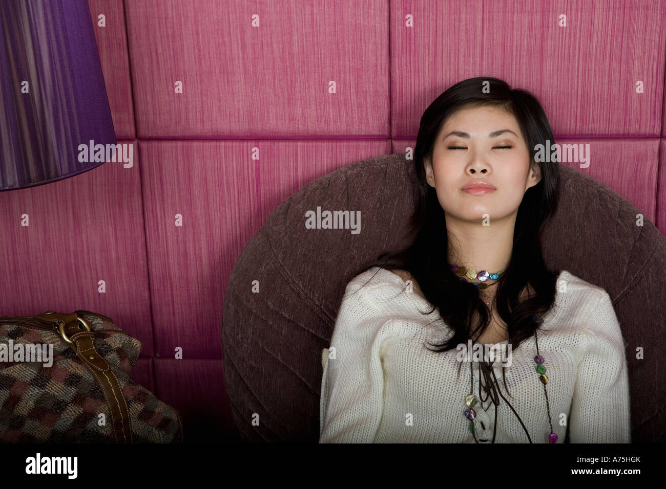 Women asleep in chair Stock Photo - Alamy