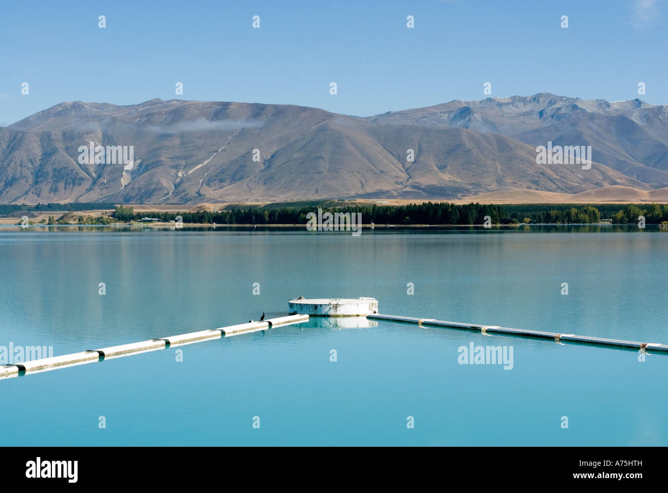 Floating booms at Lake Ruataniwha hydroelectric dam Stock Photo - Alamy