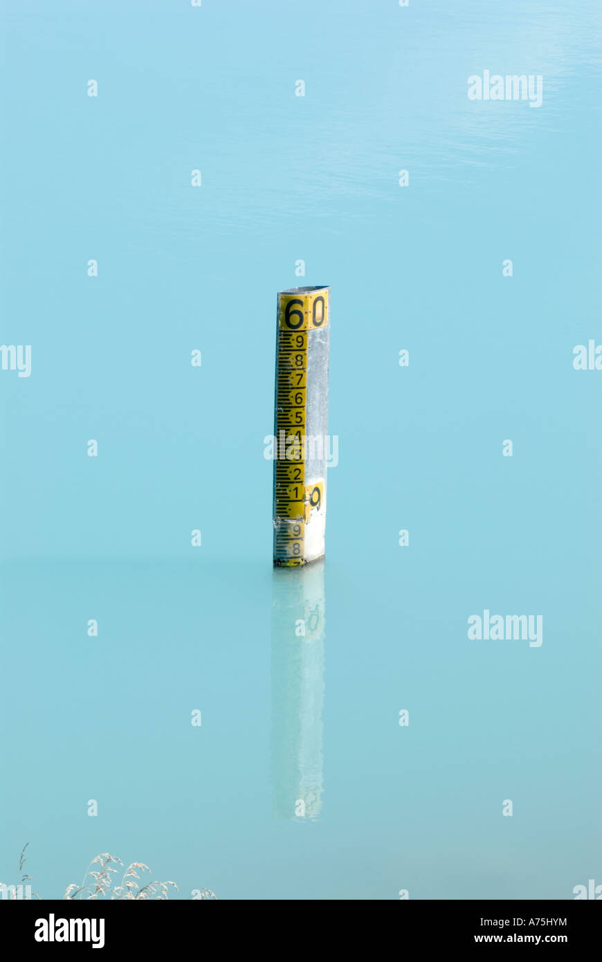 Depth measuring pole in Lake Ruataniwha Stock Photo - Alamy